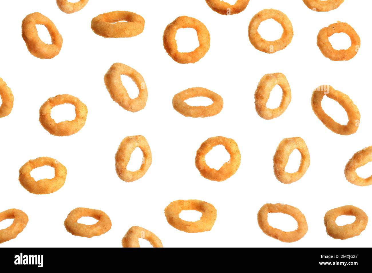 Fried onion rings falling on white background Stock Photo - Alamy