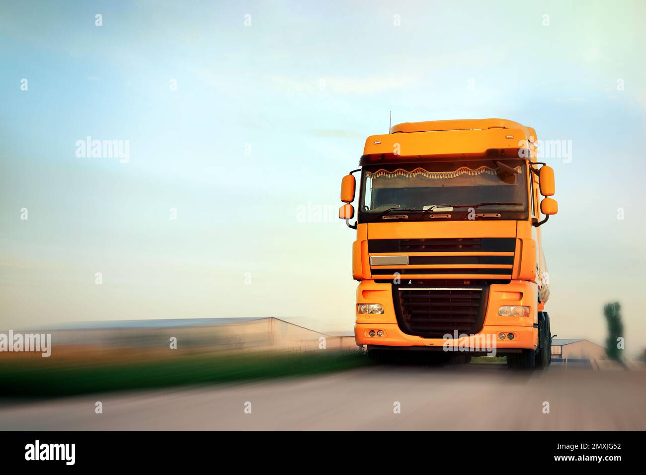 Logistics concept. Truck on country road, motion blur effect Stock ...