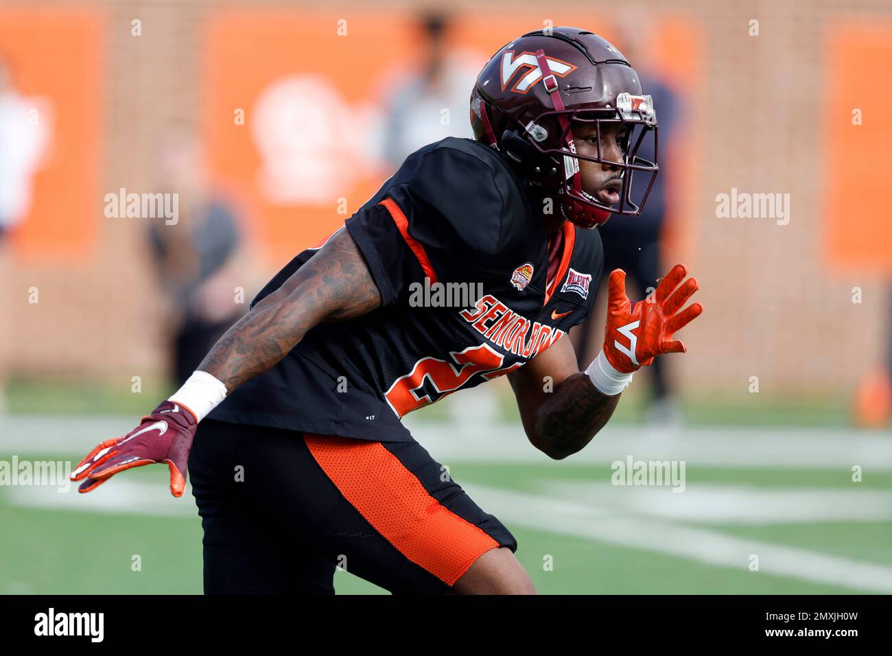 American defensive back Chamarri Conner of Virginia Tech (22) runs ...