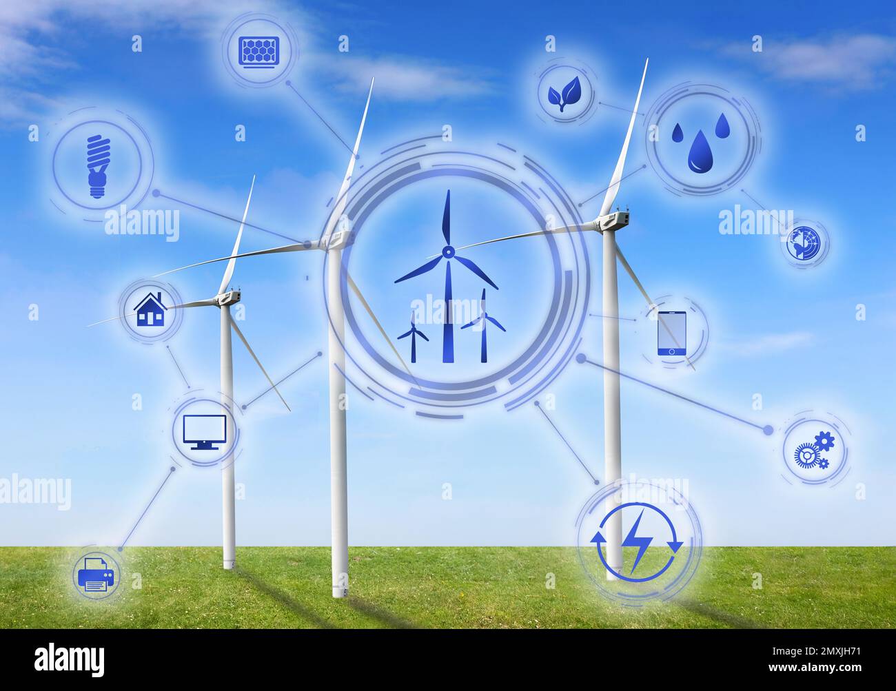 Alternative energy source. Wind turbines in field under blue sky and ...