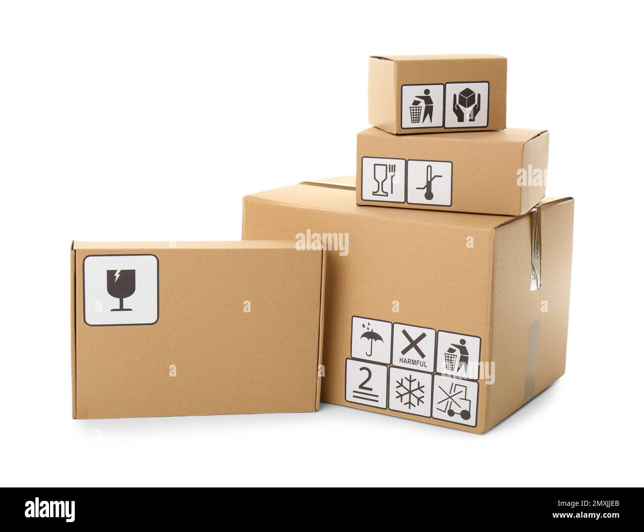Cardboard boxes with different packaging symbols on white background ...