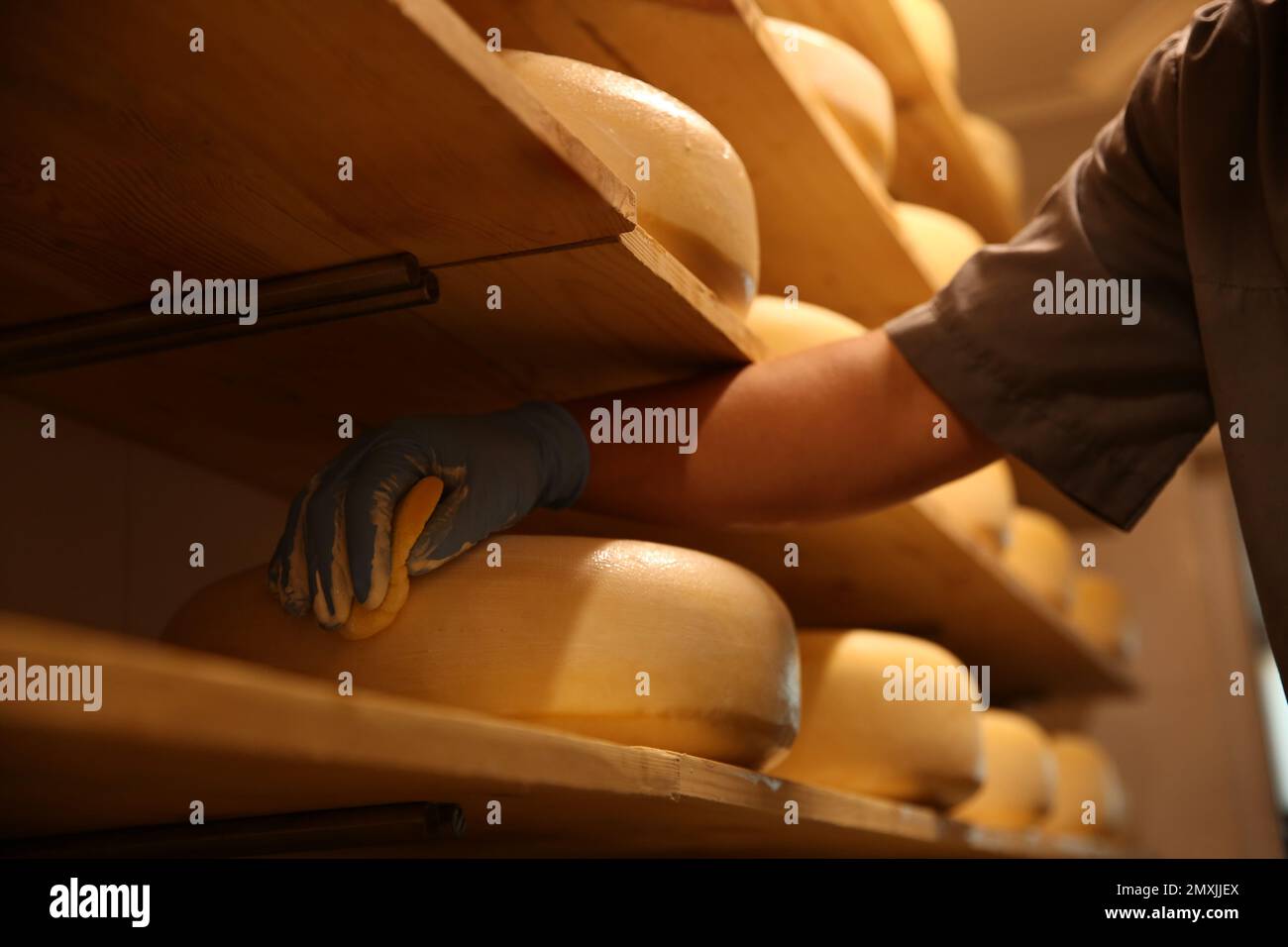 Coating and maturing cheese hi-res stock photography and images - Alamy