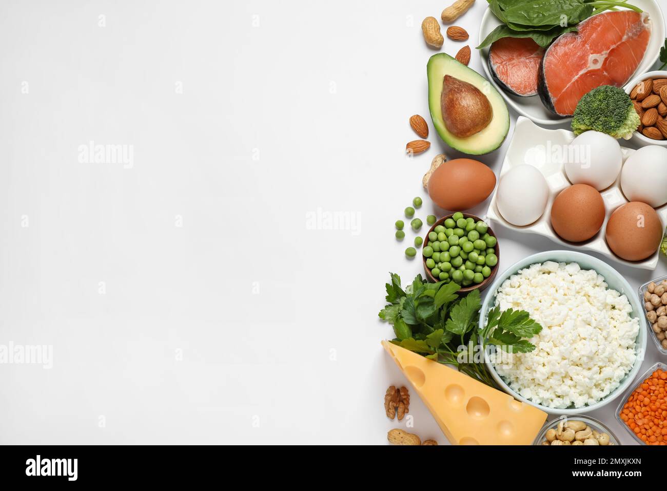 Different products rich in protein on white background, flat lay Stock ...