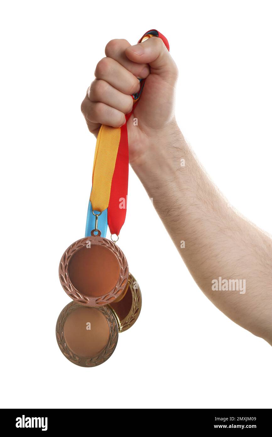 Man holding medals on white background, closeup. Space for design Stock ...