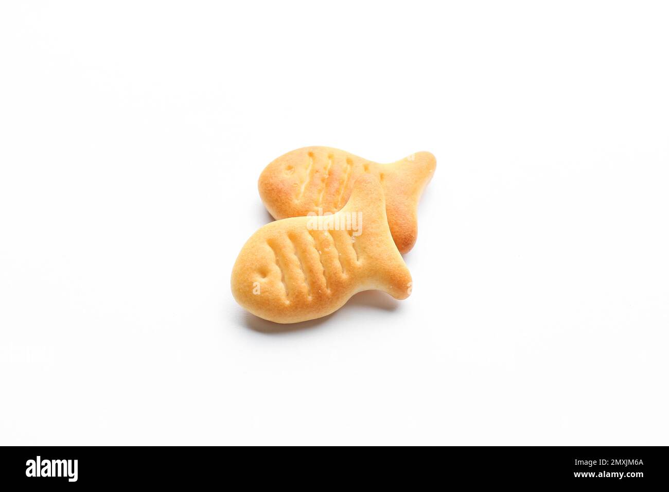 Delicious crispy goldfish crackers on white background Stock Photo - Alamy