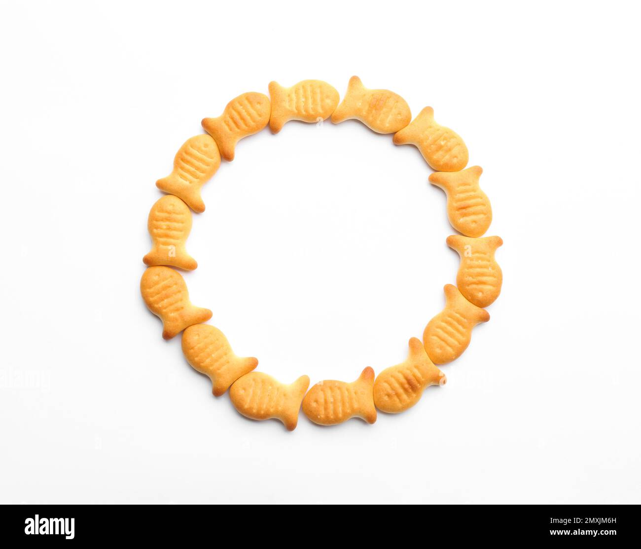 Delicious crispy goldfish crackers on white background, top view Stock ...