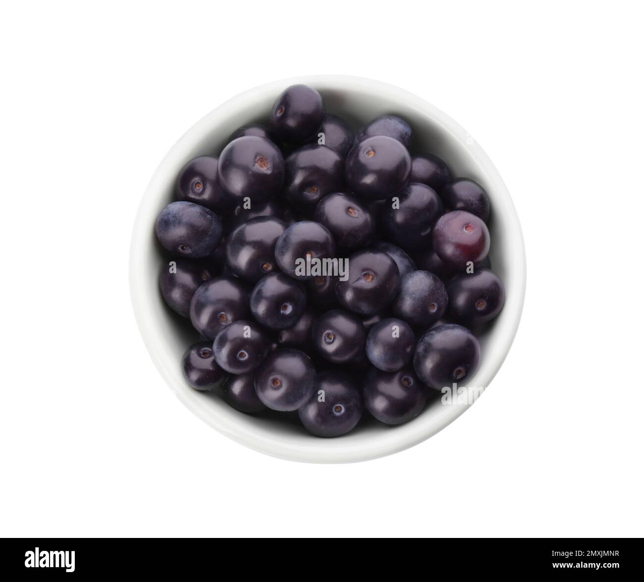 Fresh acai berries in bowl isolated on white, top view Stock Photo - Alamy