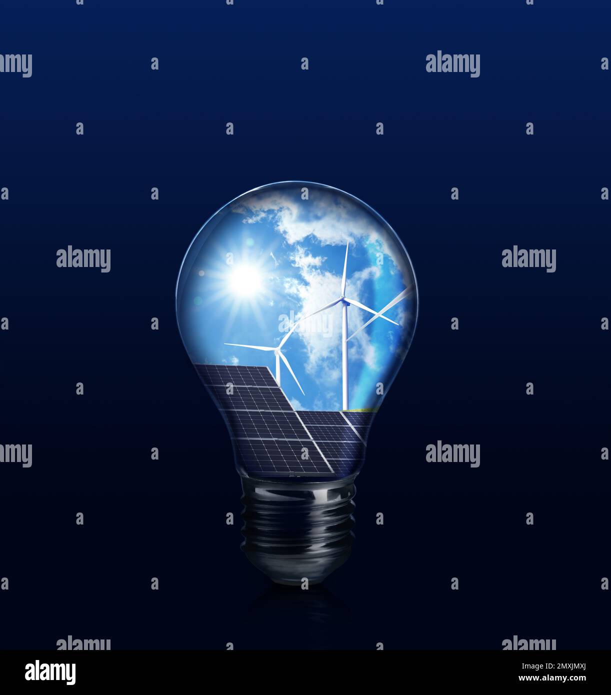 Alternative energy source. Light bulb with solar panels and wind ...