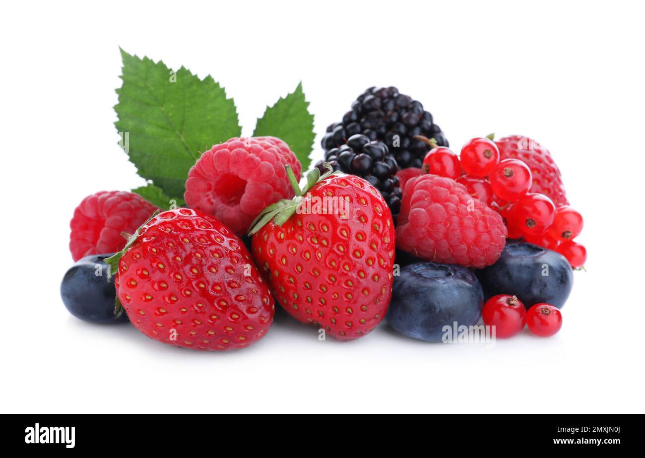 Pile of different ripe tasty berries and green leaves isolated on white ...