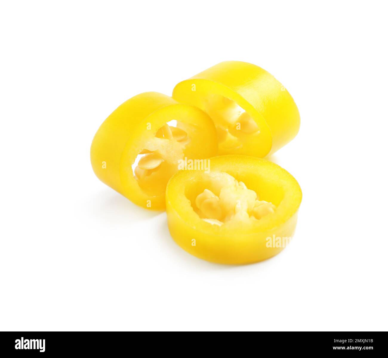 Cut ripe yellow chili pepper isolated on white Stock Photo - Alamy