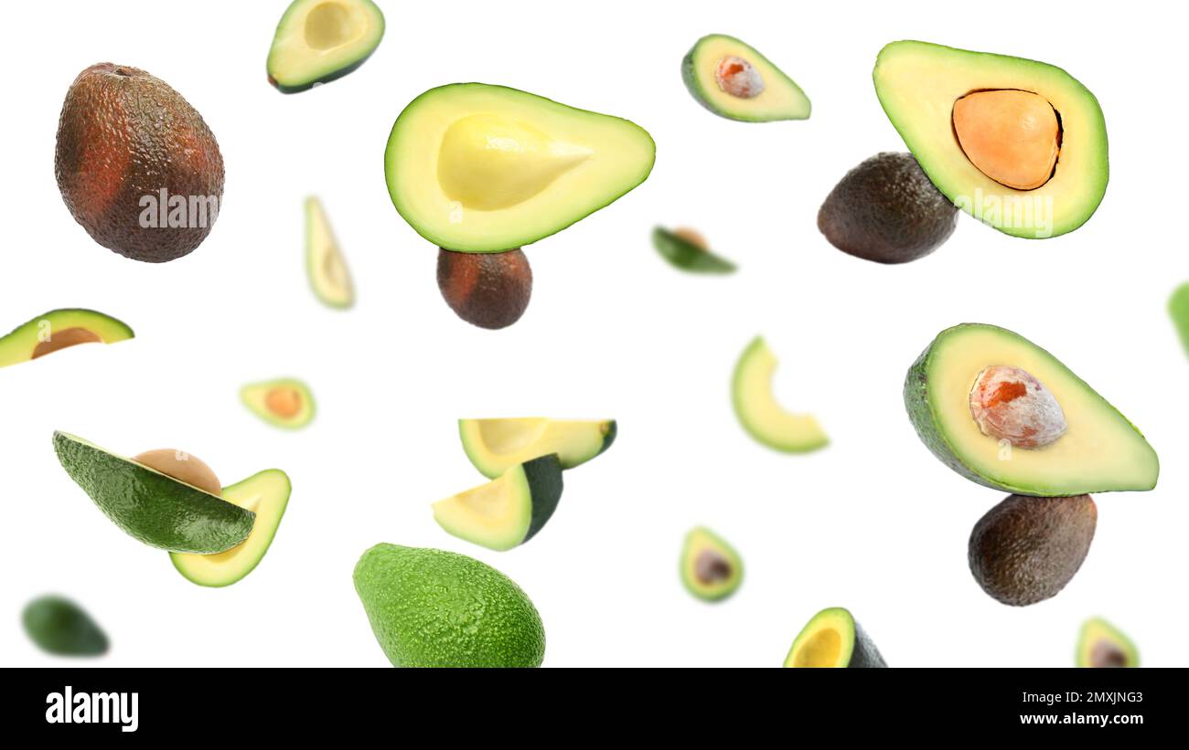 Fresh ripe avocados falling on white background, banner design Stock ...