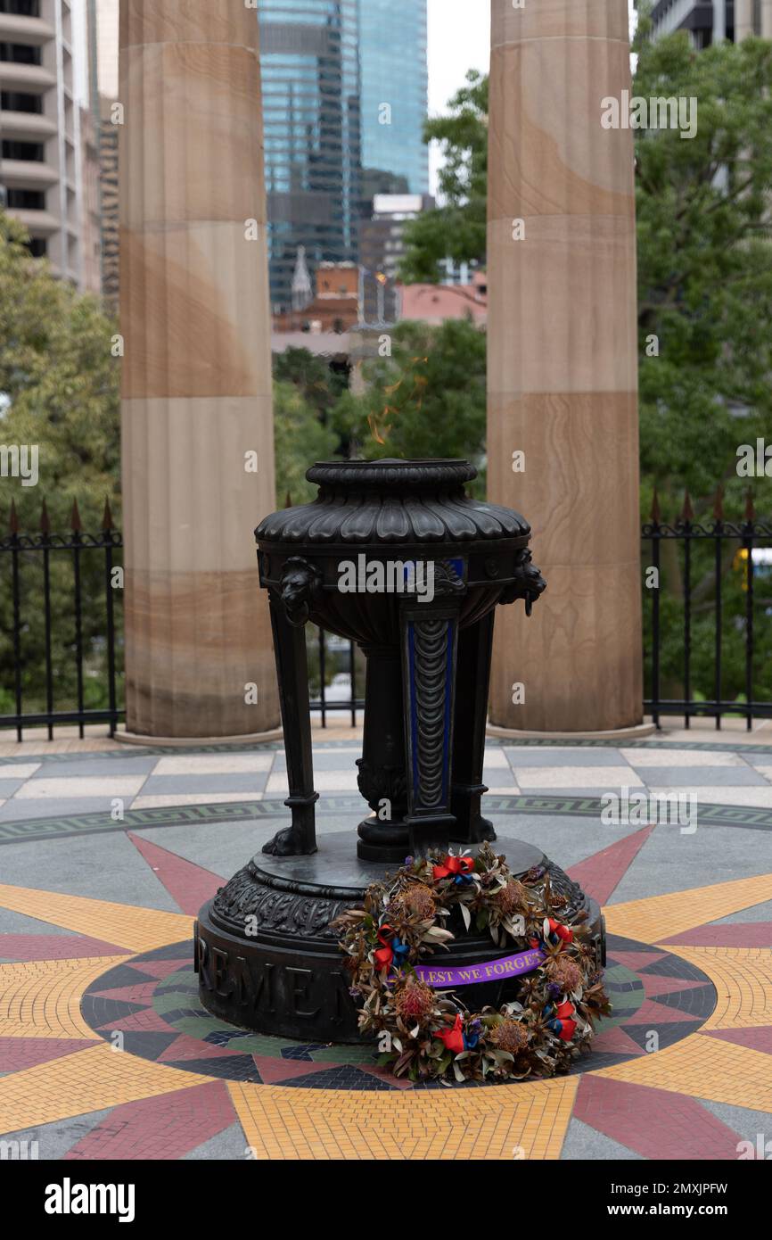 A vertical view of the eternal flame in the Anzac Square war memorial ...