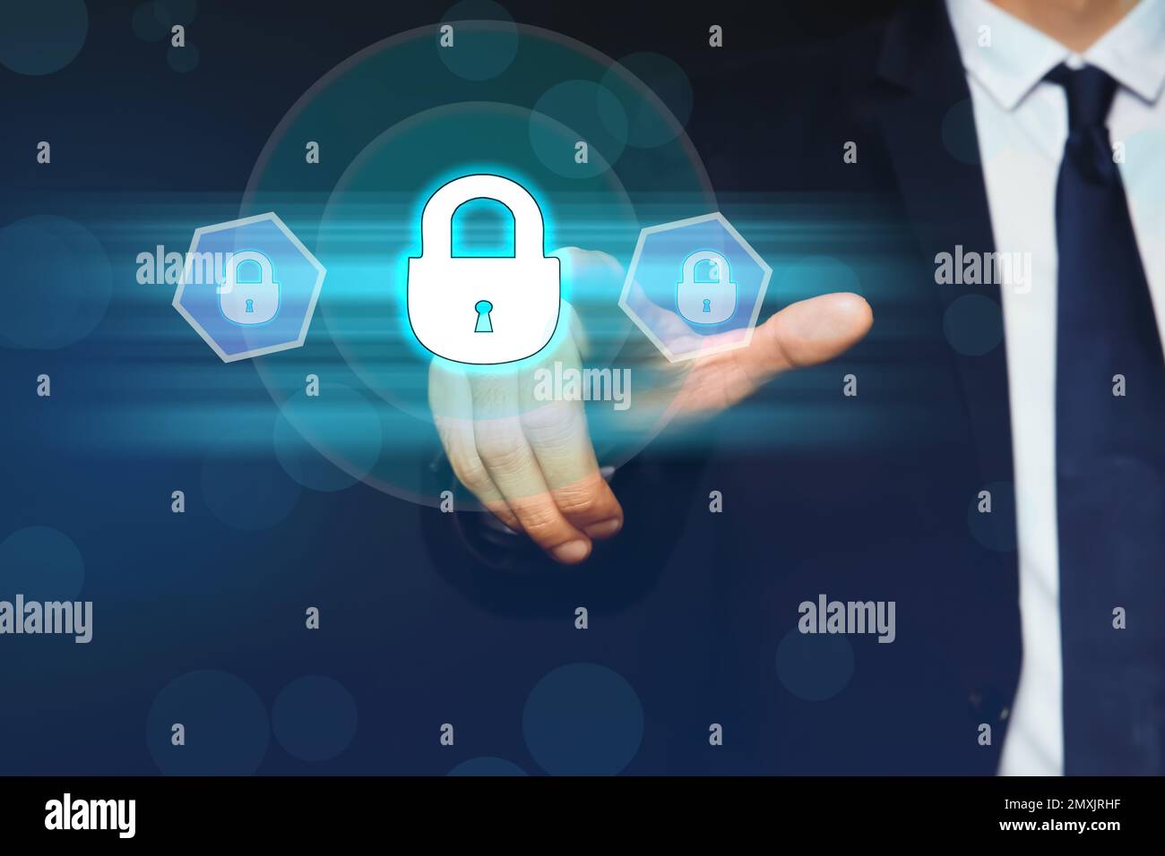 Cyber security concept. Man using virtual screen with padlock ...