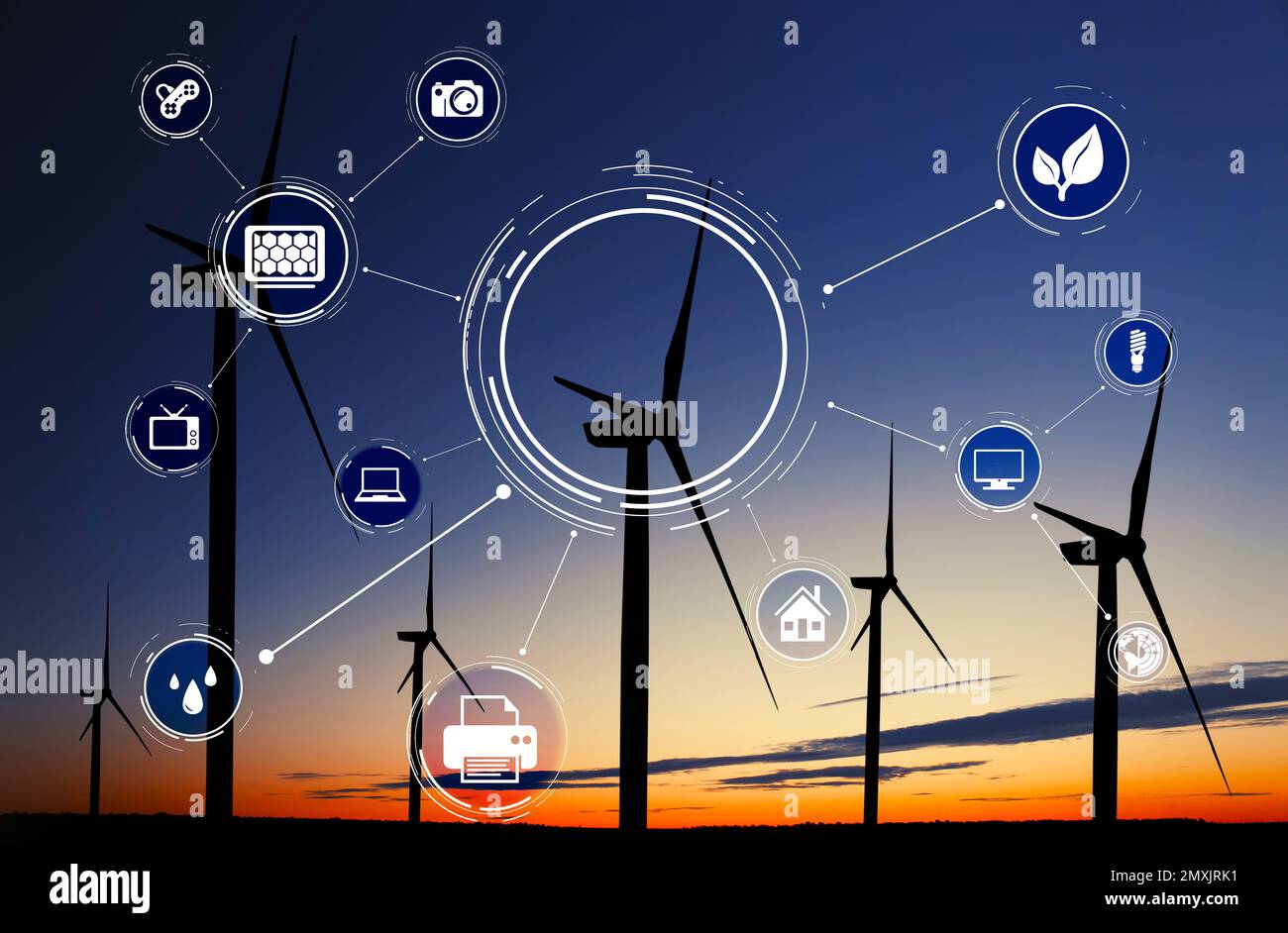 Alternative energy source. Silhouettes of wind turbines at sunset and ...