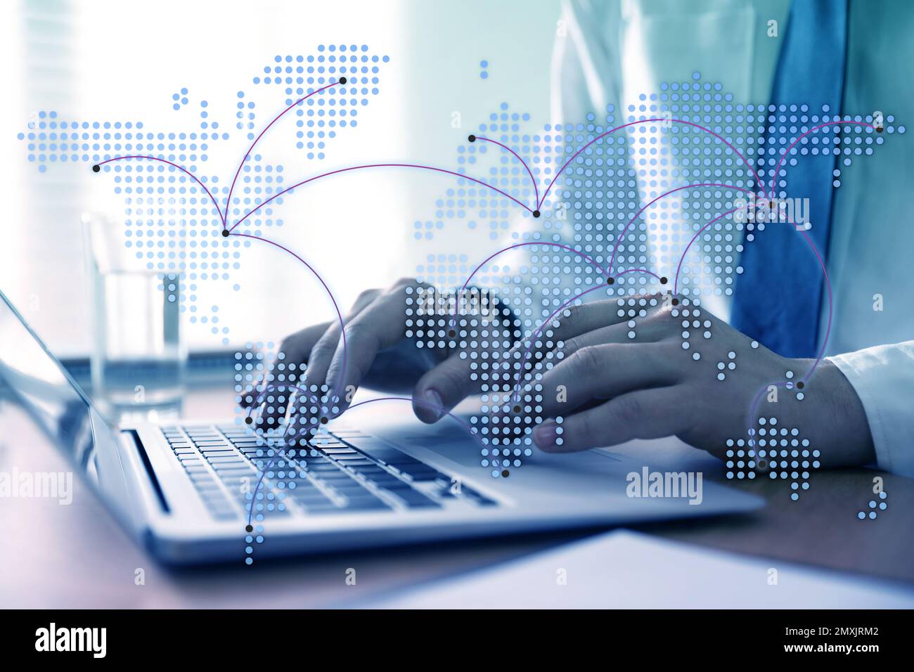 Wholesale and logistics concept. Man using laptop in office, world map ...