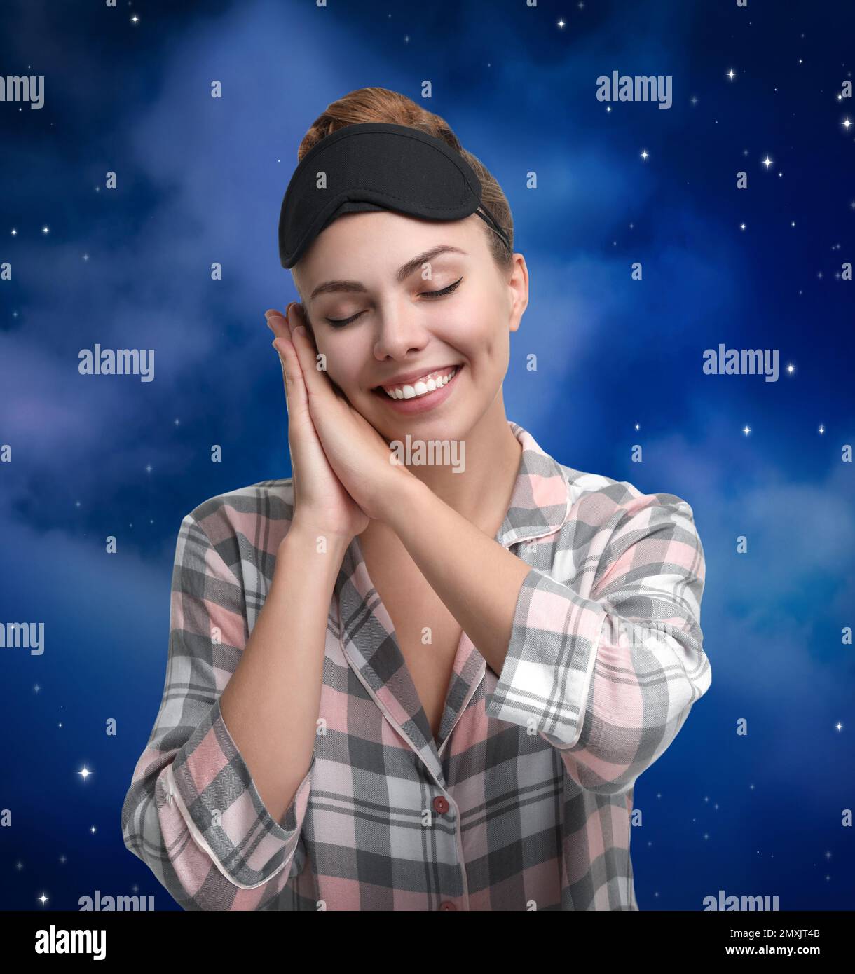 Beautiful woman and night starry sky on background. Bedtime Stock Photo ...