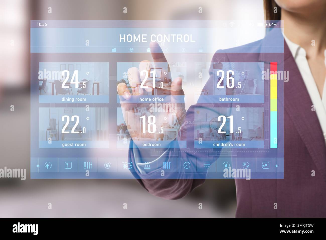 Woman using touchscreen panel to set indoor temperature, closeup. Smart ...