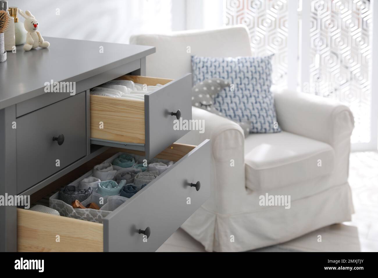 Diapers in chest of drawers hi-res stock photography and images - Alamy