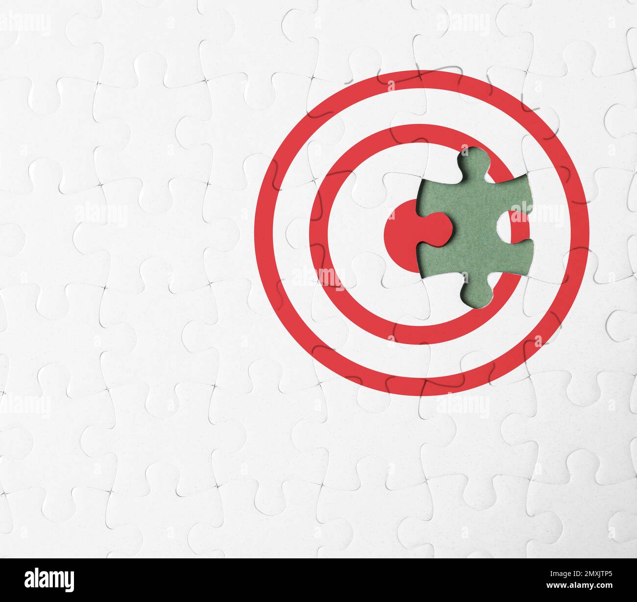 Purpose concept. White puzzle with missing piece on green background ...