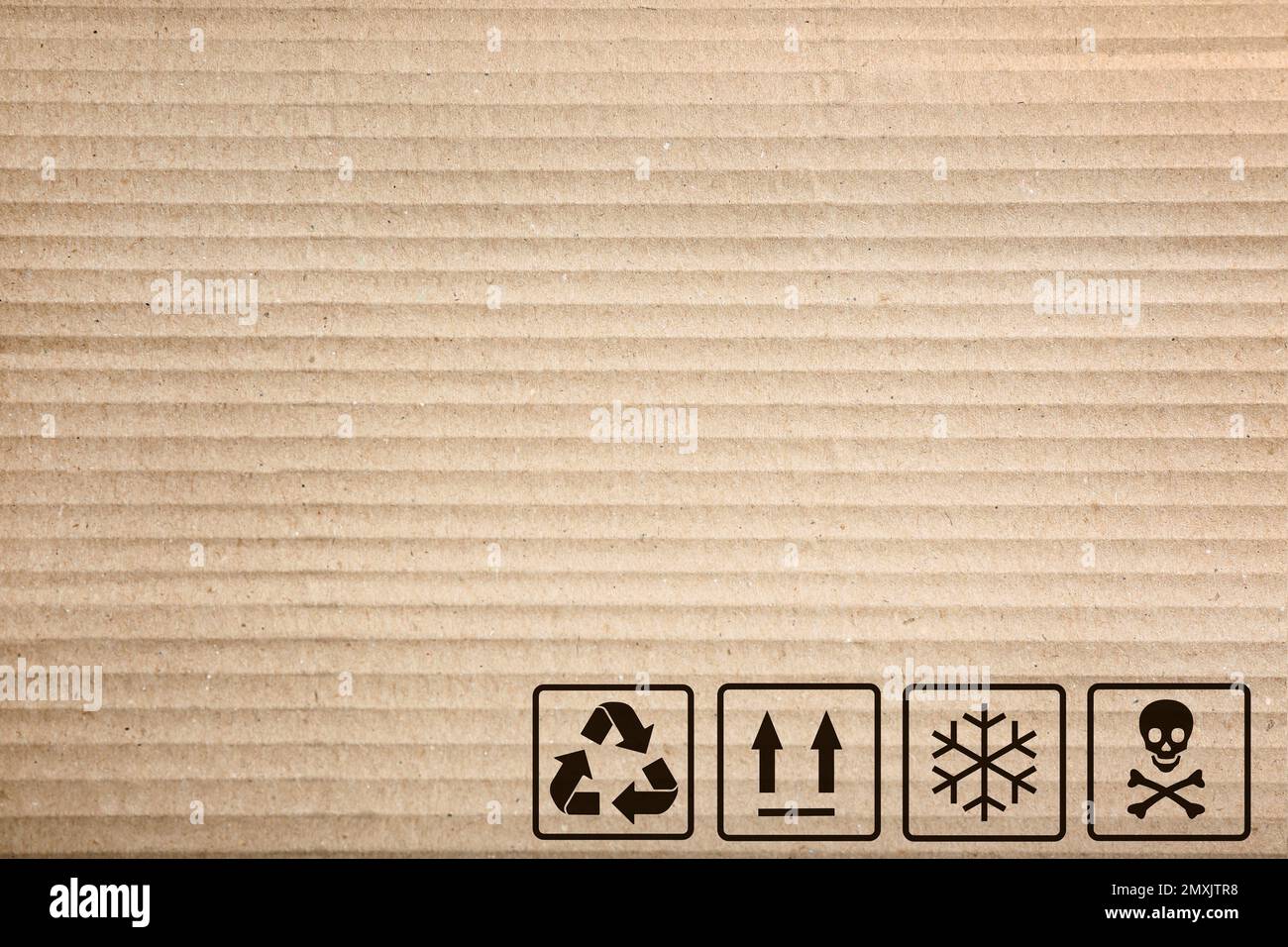 Cardboard box with packaging symbols as background, closeup Stock Photo ...