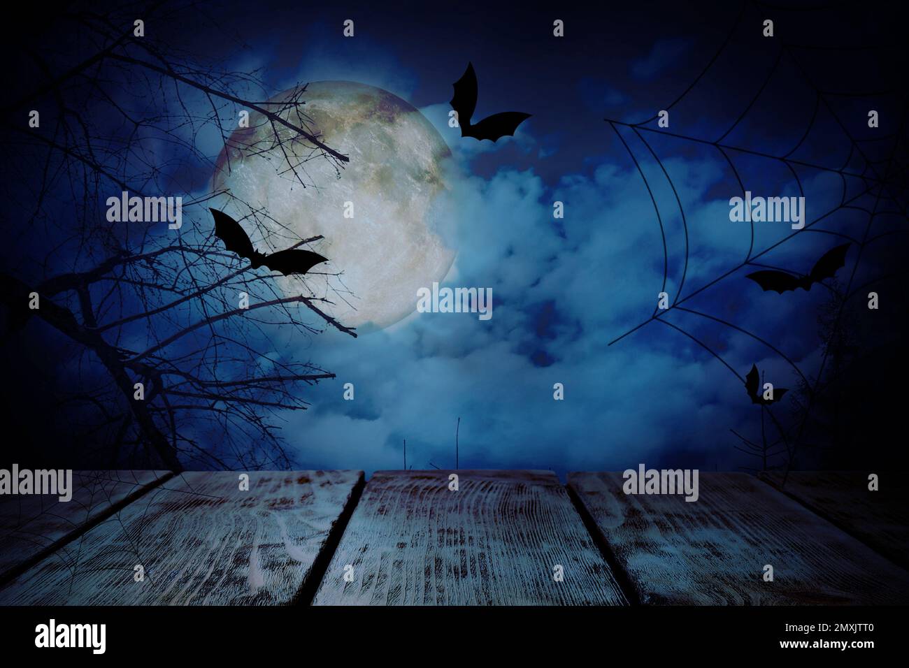 Wooden surface and bats flying in night sky with full moon. Halloween ...