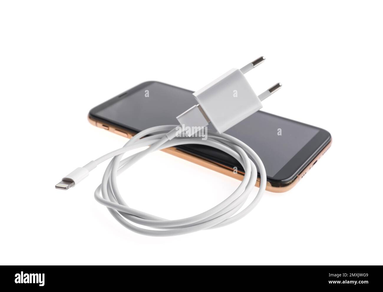 Smartphone and USB charger isolated on white. Modern technology Stock ...