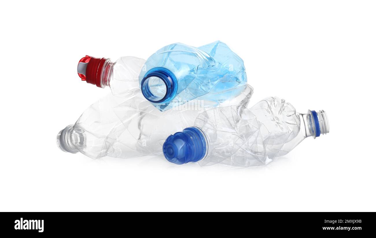 Pile of crumpled bottles isolated on white. Plastic recycling Stock Photo - Alamy