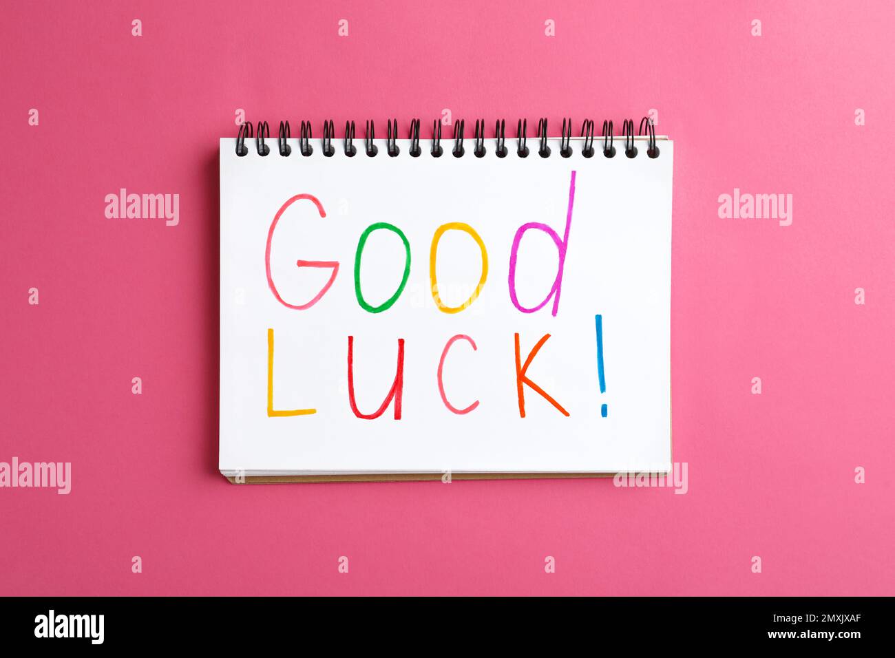 Notebook with phrase GOOD LUCK on pink background, top view Stock Photo ...