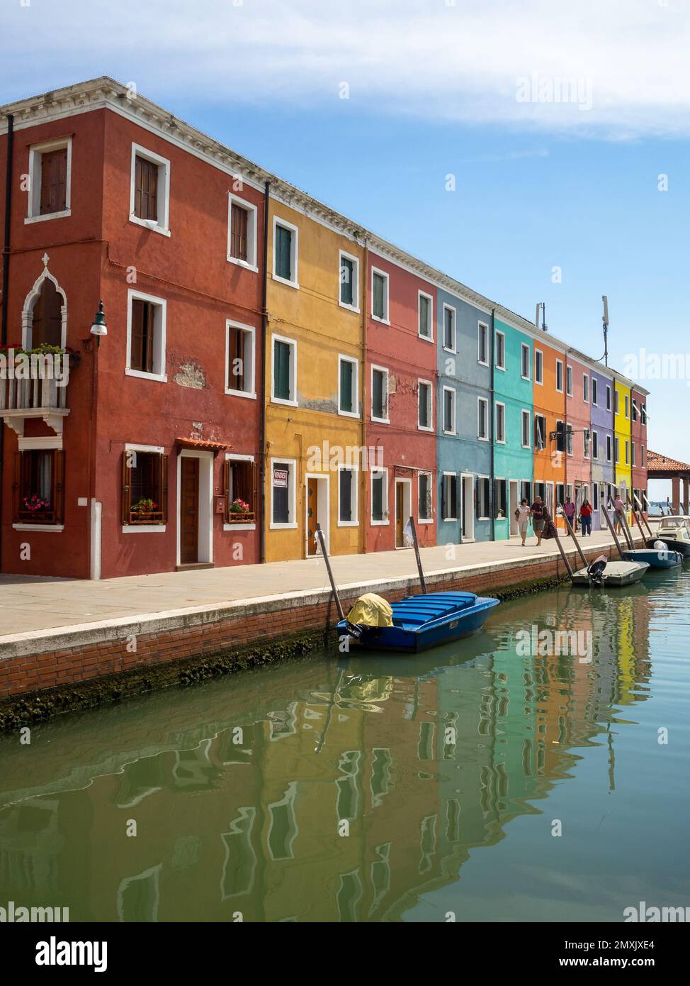 Colorful houses lined up by the canal, Burano Stock Photo - Alamy