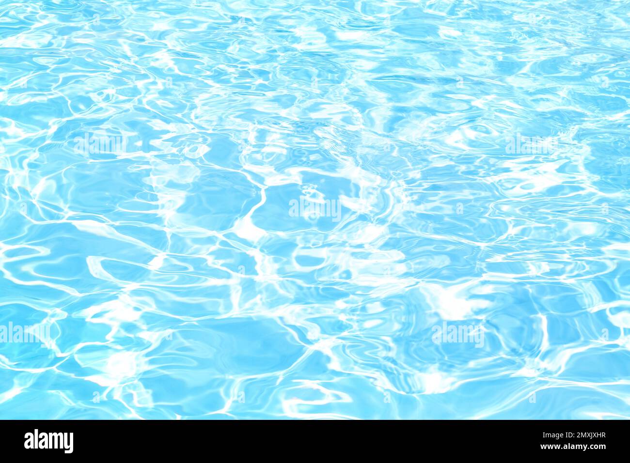 Swimming pool with clear water as background Stock Photo - Alamy