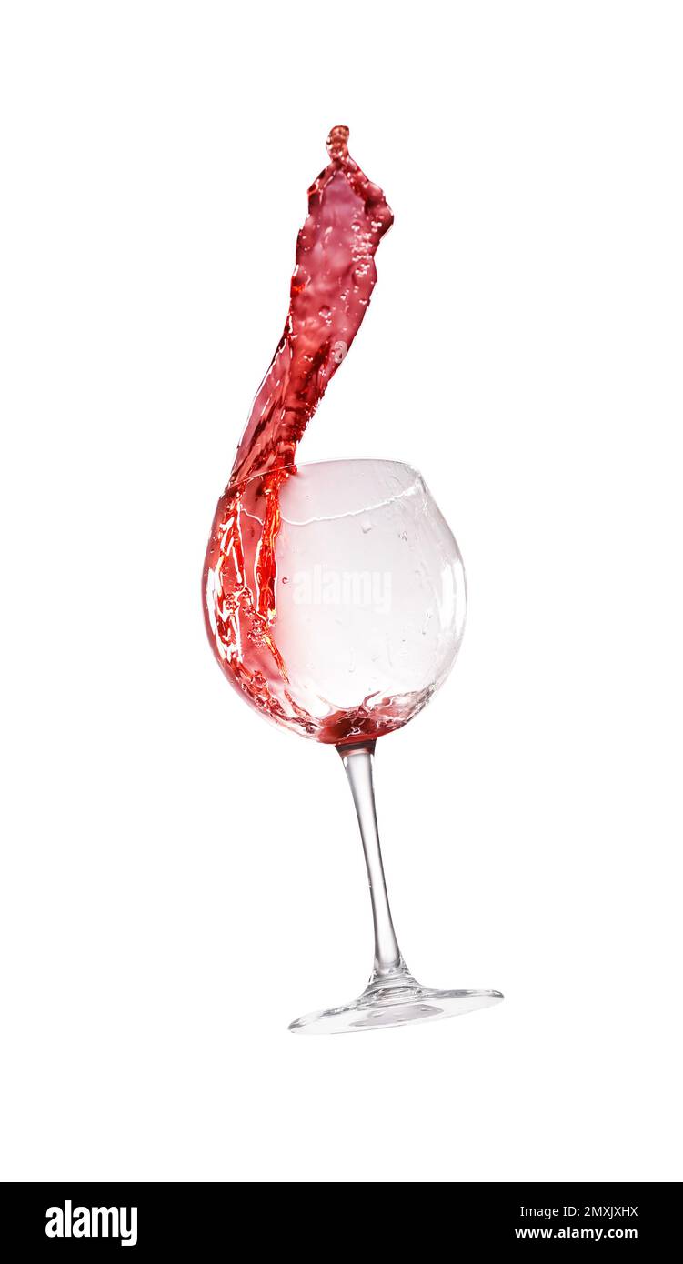 Red wine splashing out of glass on white background Stock Photo - Alamy