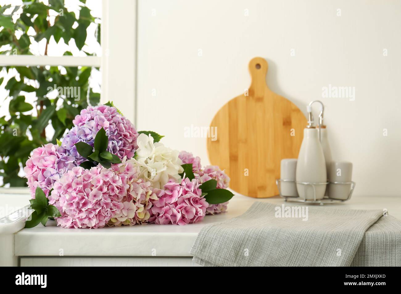 Beautiful hydrangea flowers bouquet on light countertop Stock Photo - Alamy