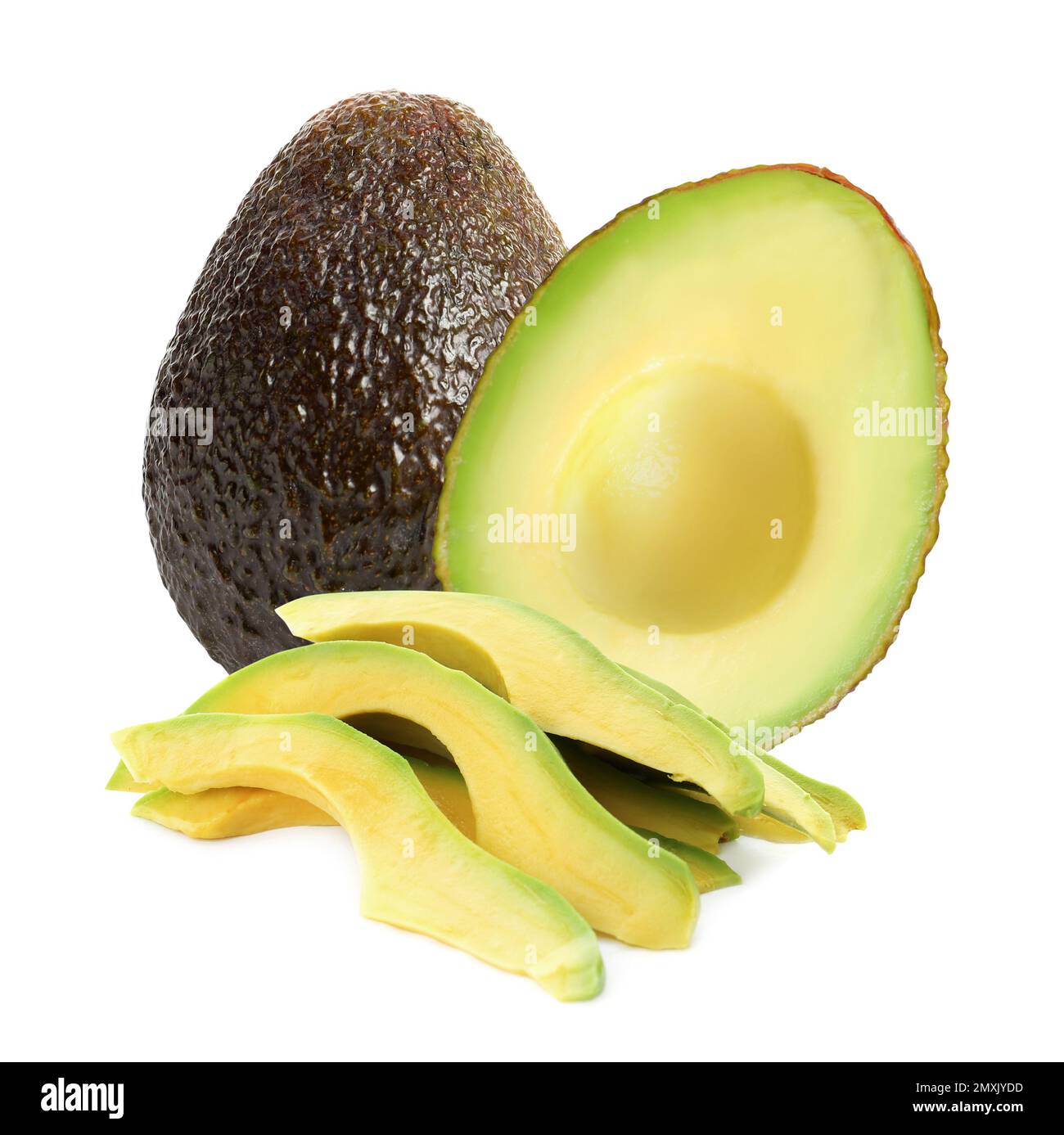 Cut and whole fresh avocados on white background Stock Photo - Alamy