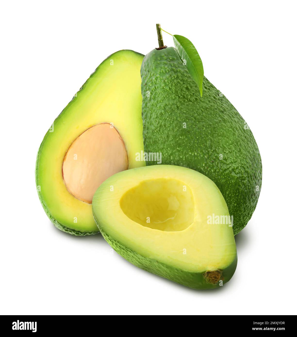Cut and whole fresh avocados on white background Stock Photo - Alamy