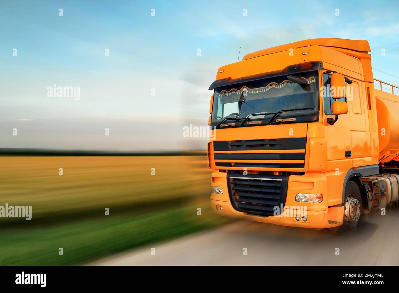 Logistics concept. Truck on country road, motion blur effect Stock ...