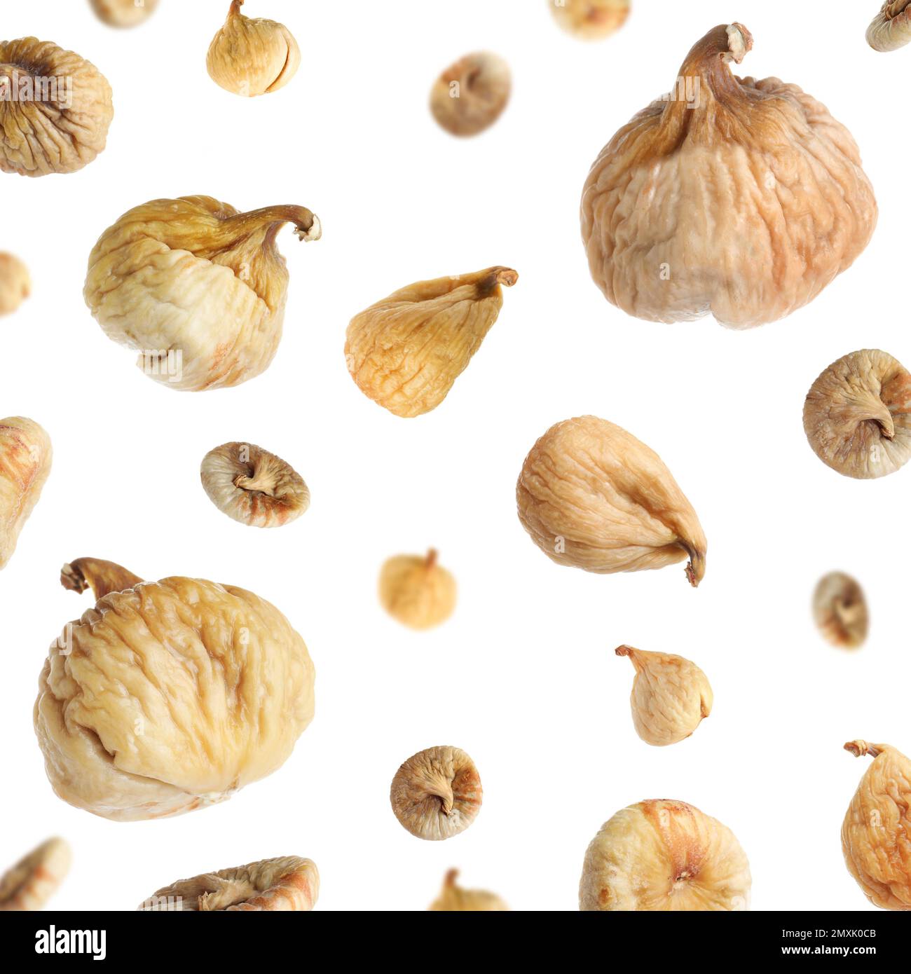Dried fig fruits falling on white background Stock Photo - Alamy