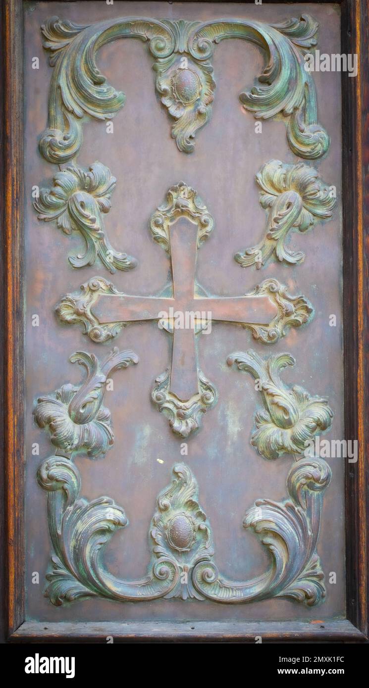 A bas-relief of an old, decorated cross Stock Photo - Alamy