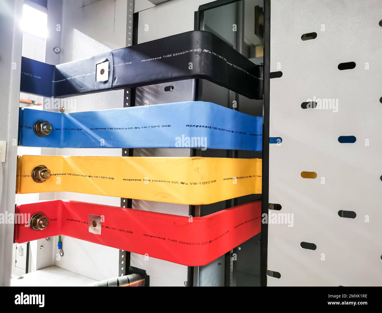 Image of copper busbar connection in electrical cabinet. Selective ...