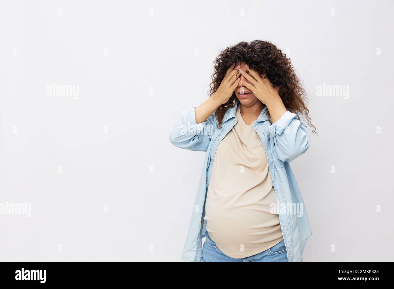 Pregnant woman tired, headache tears and frustration, difficult ...