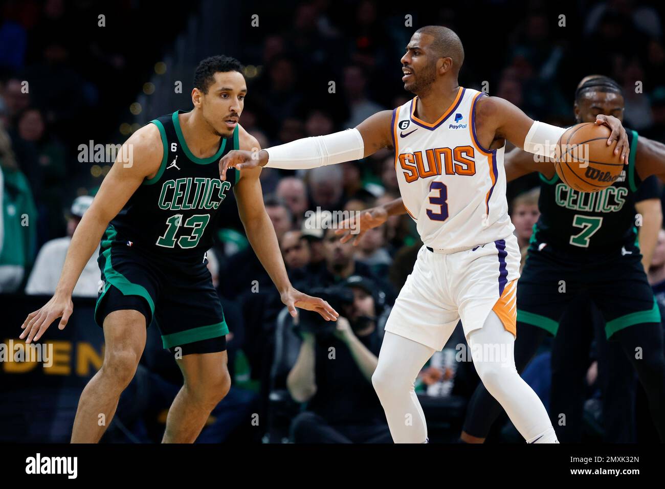 Phoenix Suns' Chris Paul (3) keeps the ball away from Boston Celtics ...