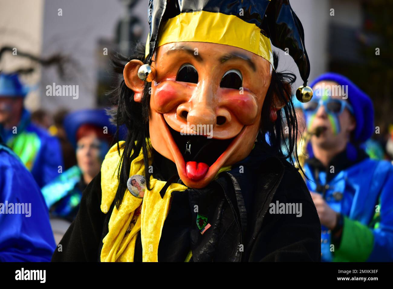 A Group of people dressed in festive costumes celebrating the Fasching ...