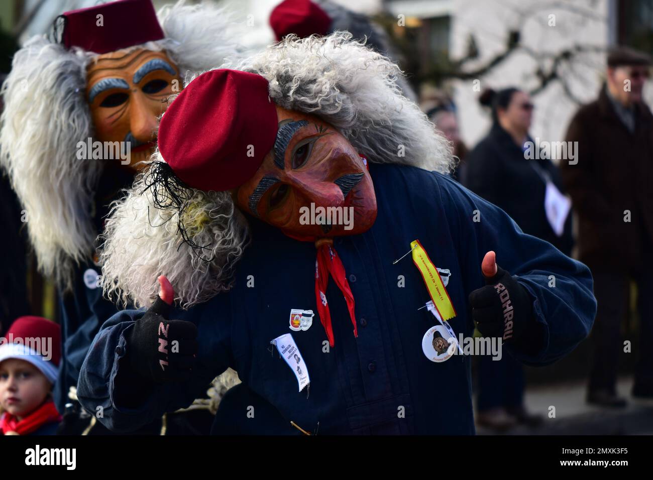 A Group of people dressed in festive costumes celebrating the Fasching ...