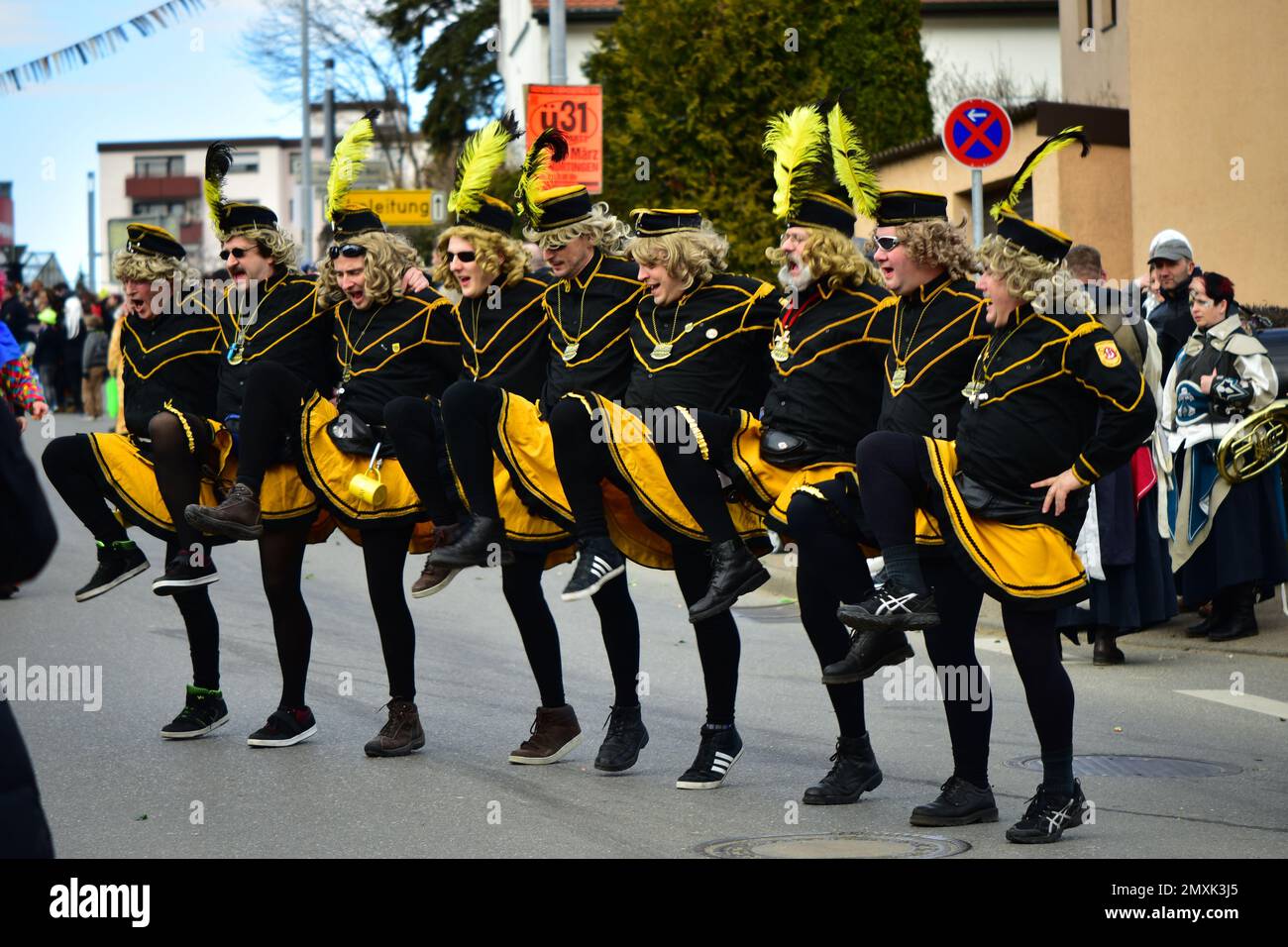A Group of people dressed in festive costumes celebrating the Fasching ...