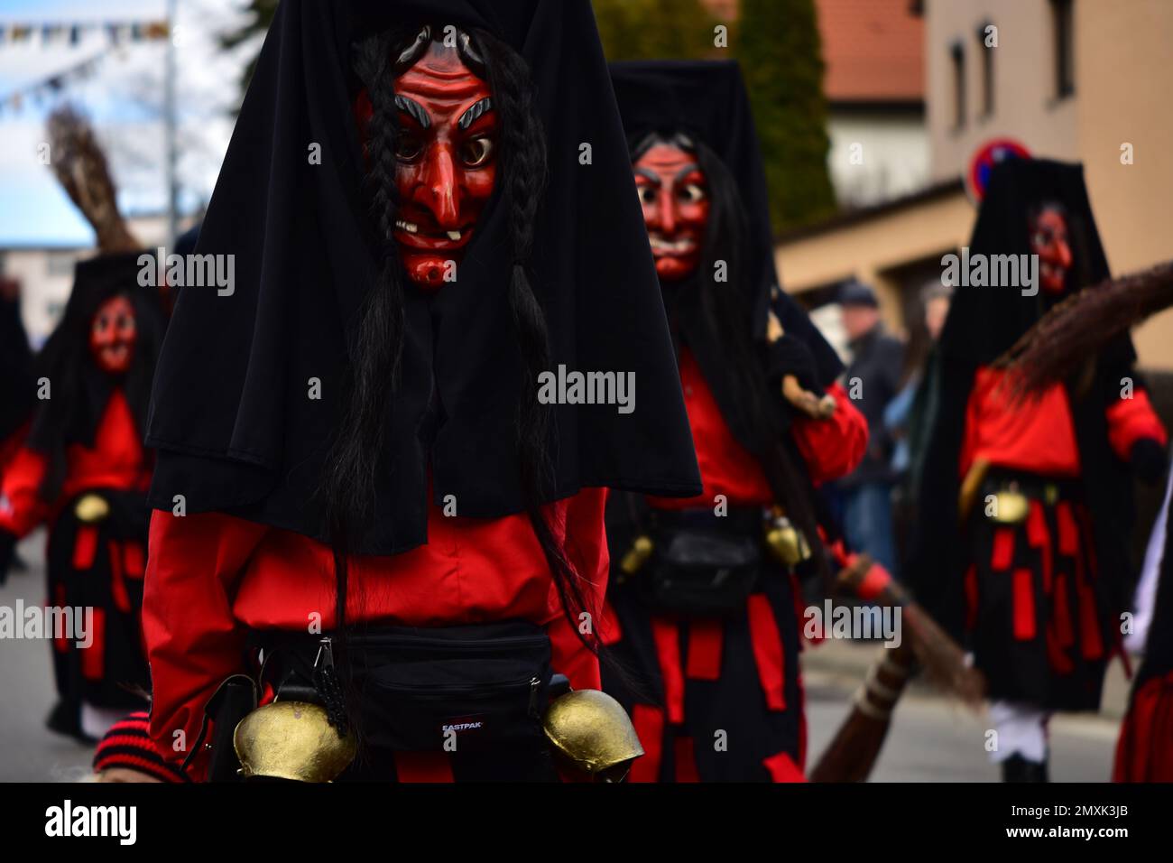 A Group of people dressed in festive costumes celebrating the Fasching ...