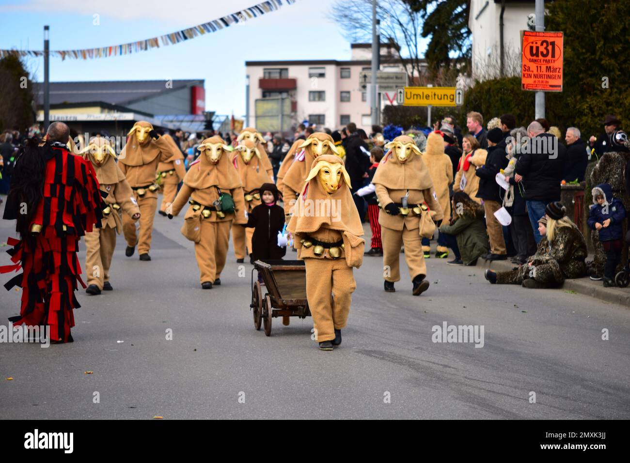 A Group of people dressed in festive costumes celebrating the Fasching ...