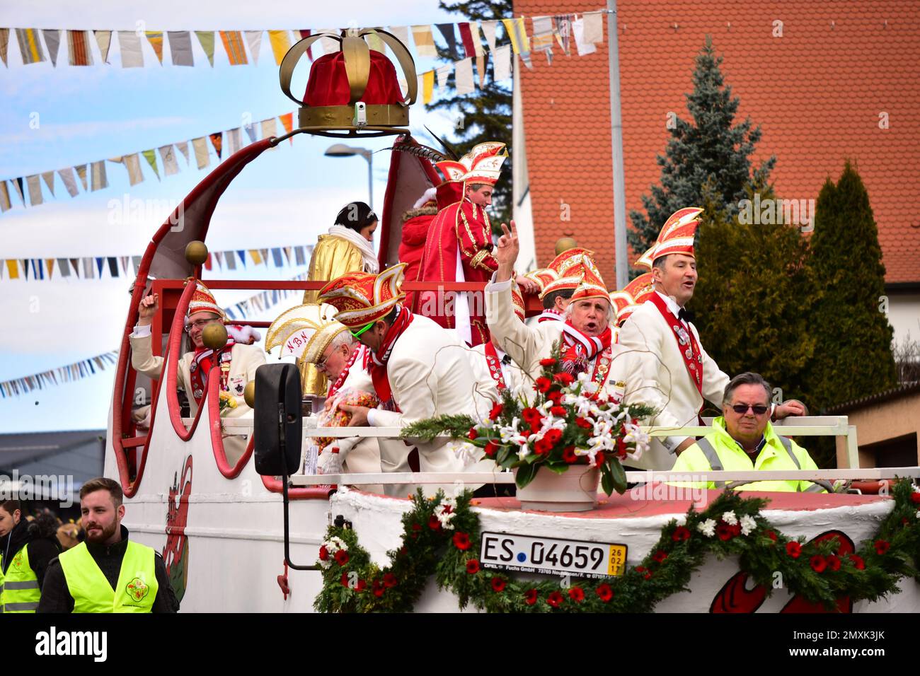 A Group of people dressed in festive costumes celebrating the Fasching ...