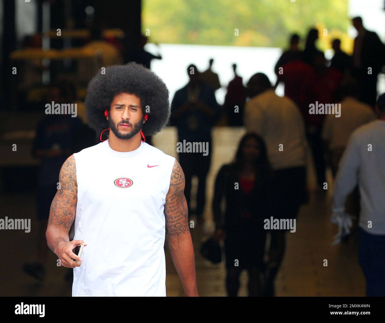 San Francisco 49ers quarterback Colin Kaepernick walks to the field ...