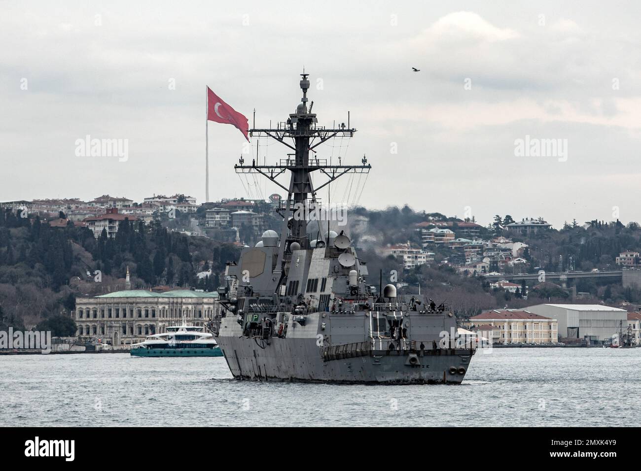 The Turkish Flag seen in the background while the US Navy's Arleigh ...