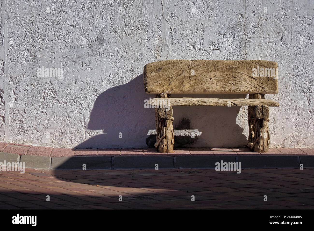 Wooden bench on village square in Oria, Andalusia, Spain, Europe Stock ...