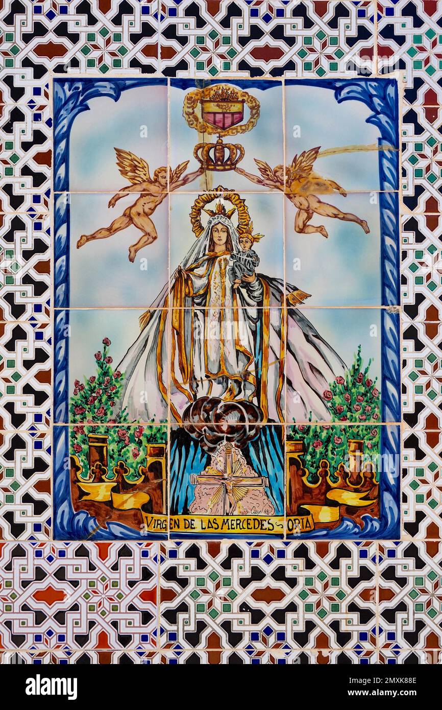 Sacred figure of the Virgin Mercedes of Oria in tile wall, Andalusia ...